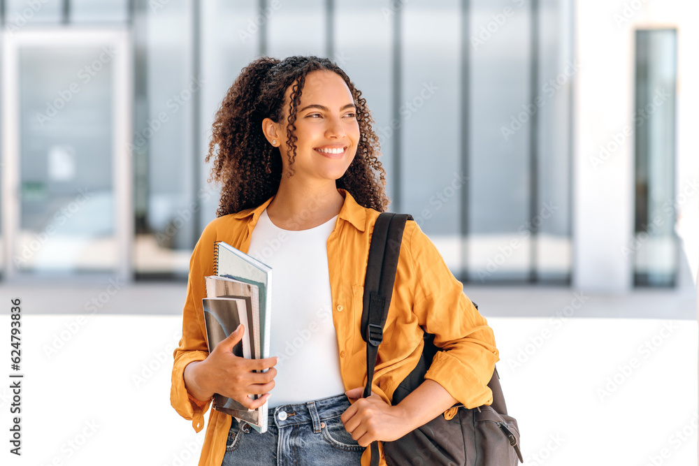 Happy female student. Positive female student, brazilian or hispanic ...