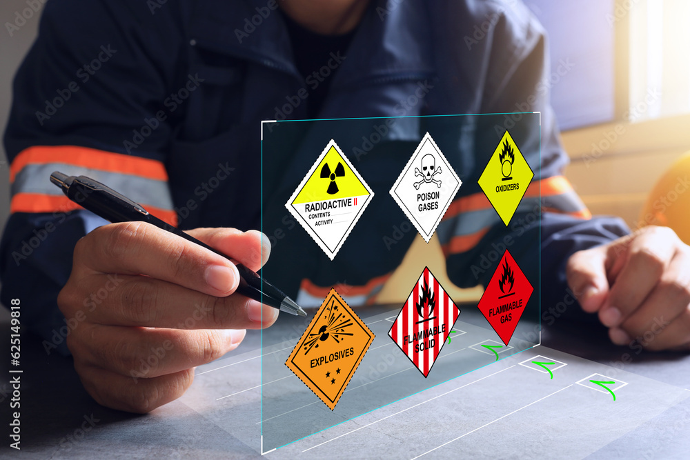 Foto de Stock The warehouse safety officer inspects the check list of ...
