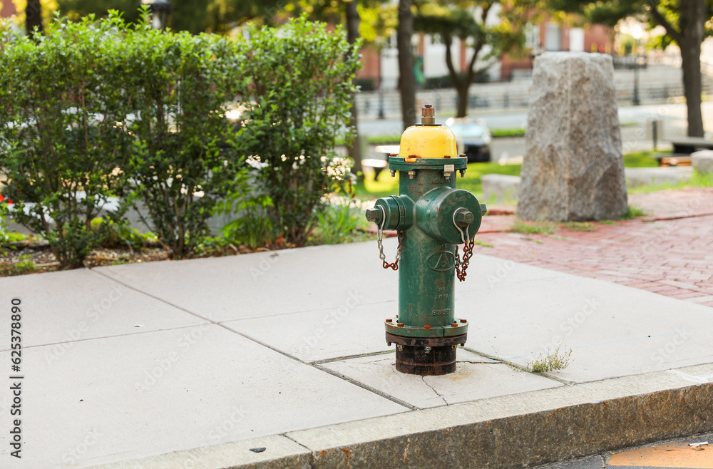 Vibrant urban symbol, fire hydrant on street embodies safety, readiness ...