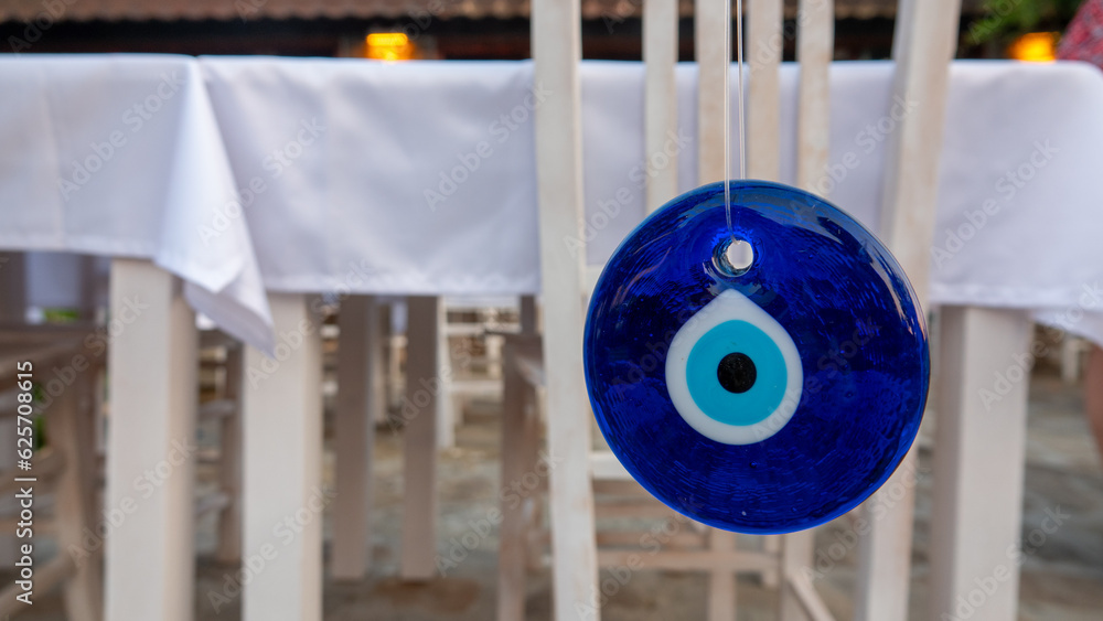Blue eyes from the evil eye - amulet hung as an ornament in front of ...