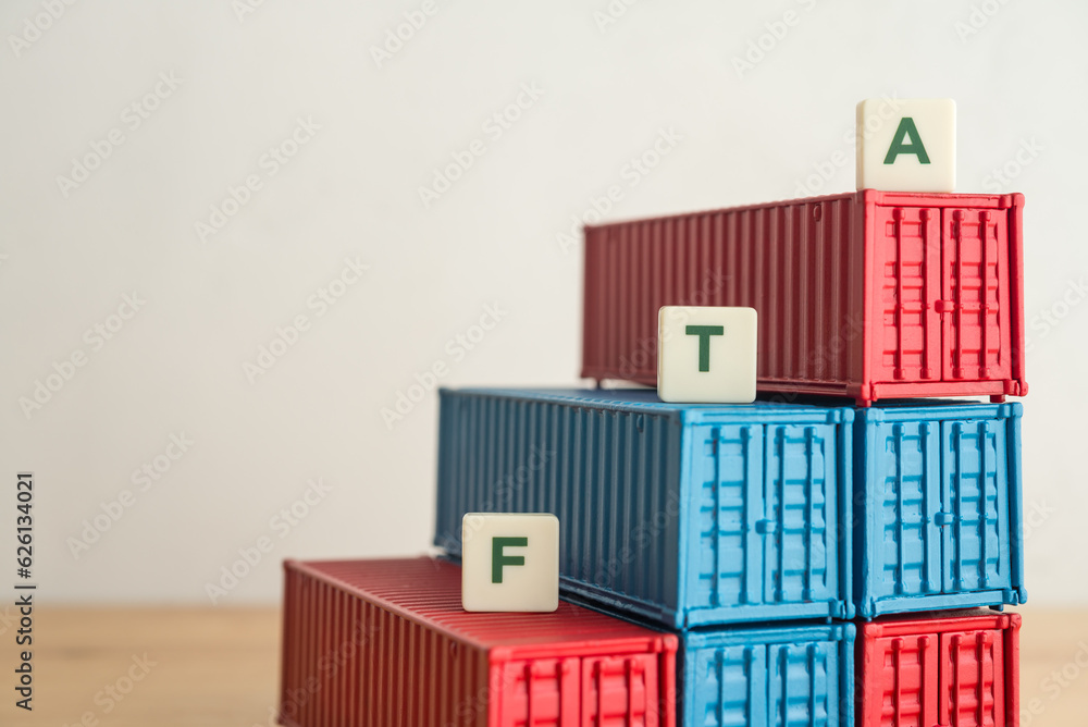 Shipping containers as graph chart growth and FTA letters with white ...