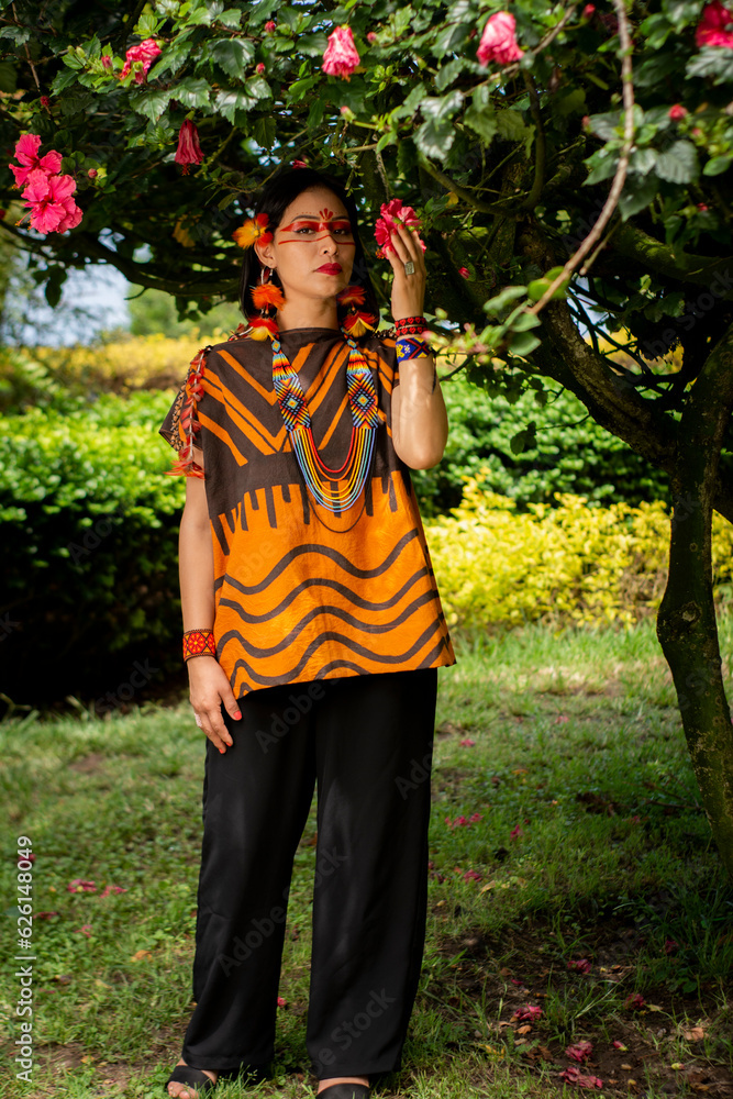 beautiful young peruvian woman of the yanesha culture posing with ...