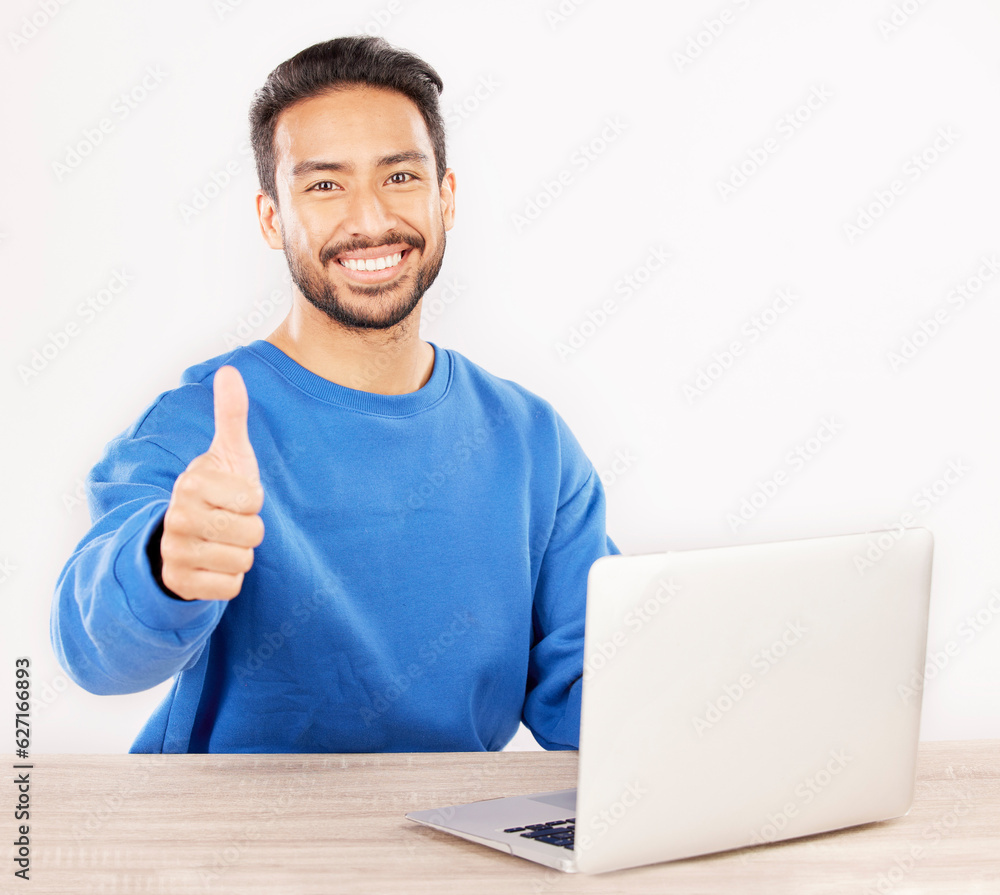 Portrait, laptop and thumbs up with an IT support man at his desk in ...