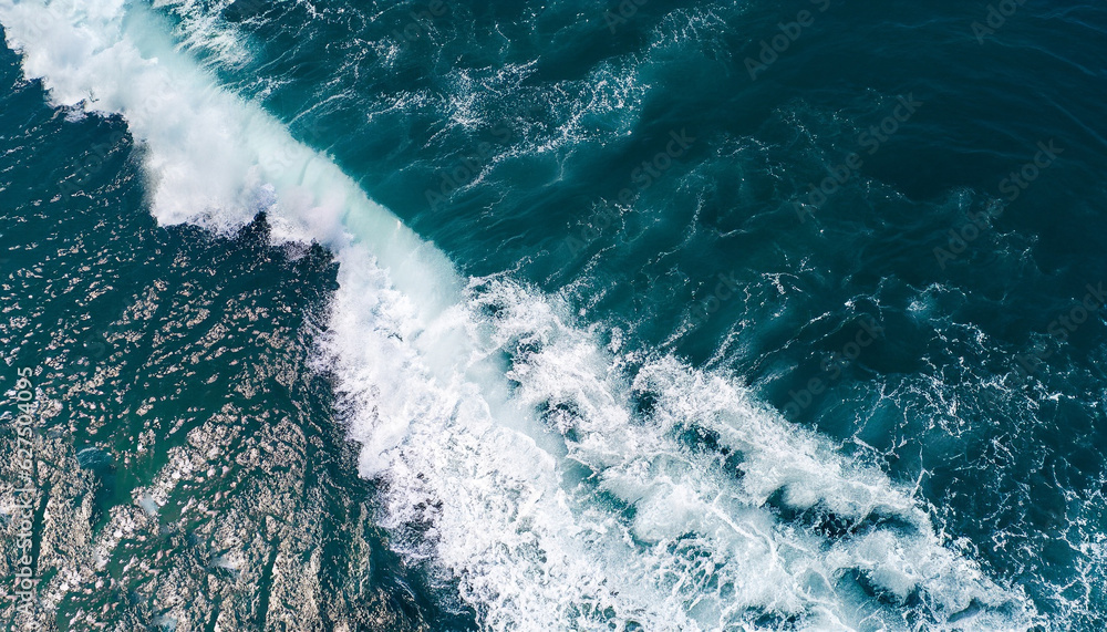 Spectacular aerial top view background photo of ocean sea water white wave splashing in the deep ...