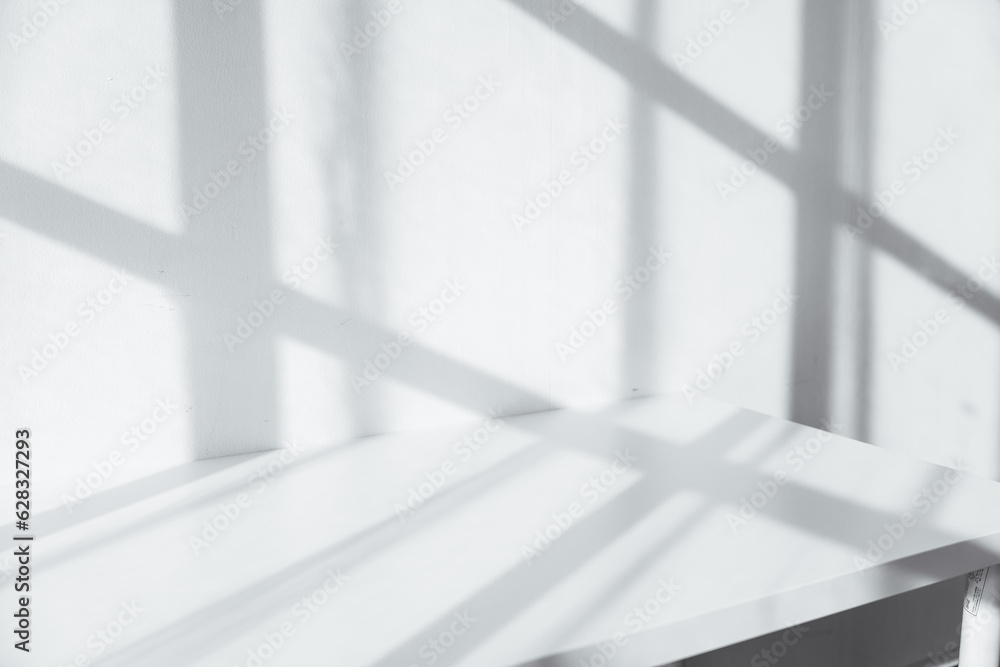 Empty tabletop with window shadow on concrete wall texture background ...