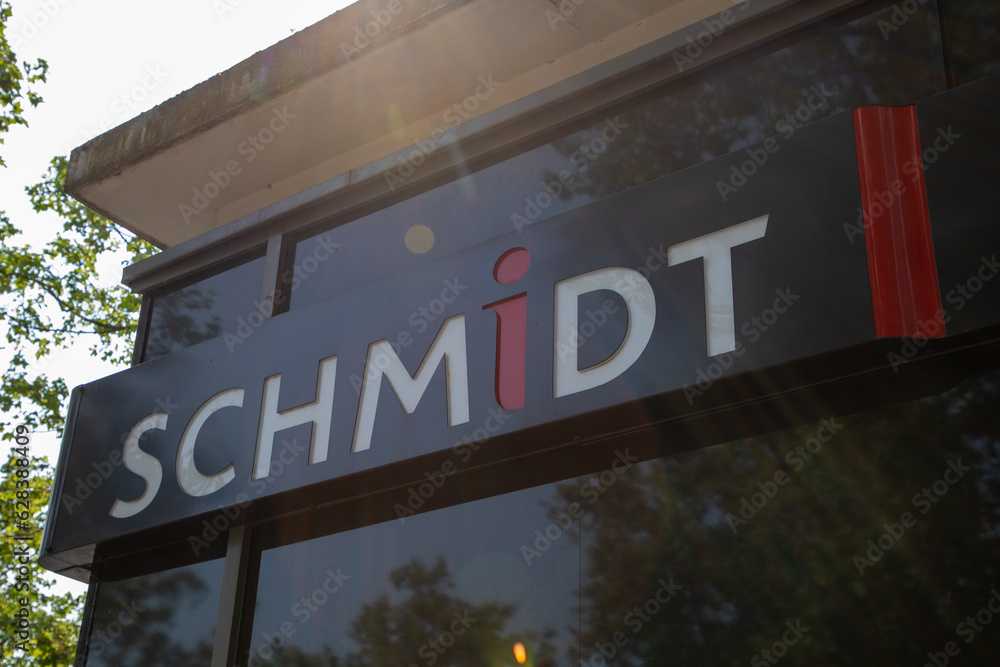 schmidt logo text and sign brand entrance wall facade store signage ...