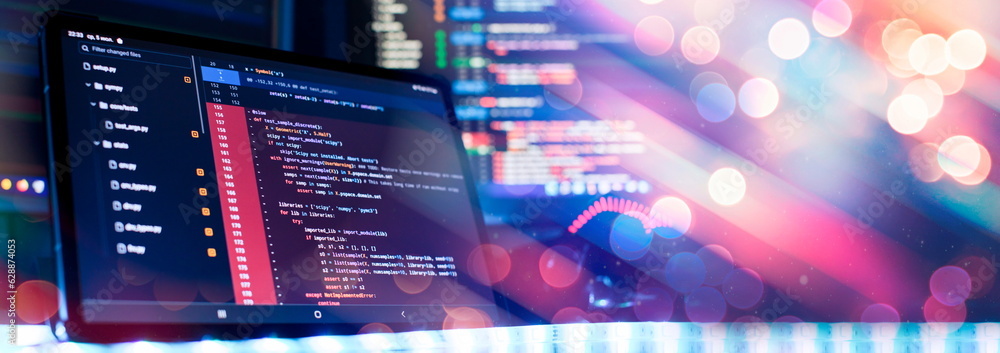 Notebook closeup photo. CSS, JavaScript and HTML usage. Monitor closeup of function source code ...