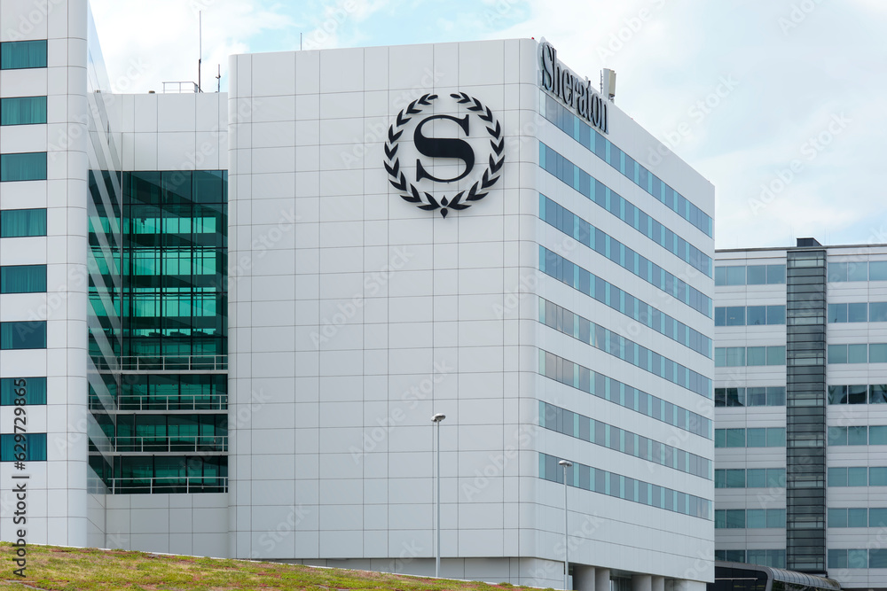 Sheraton logo on hotel building. Sheraton Hotels is a brand name of the ...