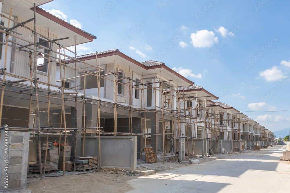 construction residential new house in progress at building site housing ...