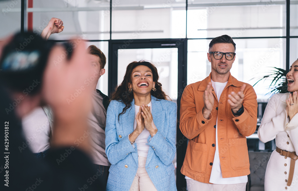 Cheerful male and female colleagues satisfied with friendly teamwork ...