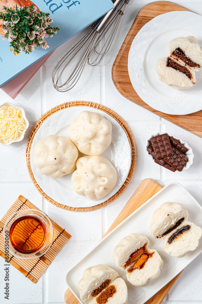 Baozi or Chinese Steamed Buns is a type of yeast-leavened filled bun in ...
