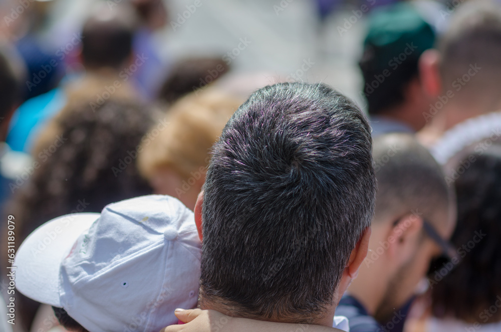 gathering, people from behind anonymous, in the crowd, head of an adult ...