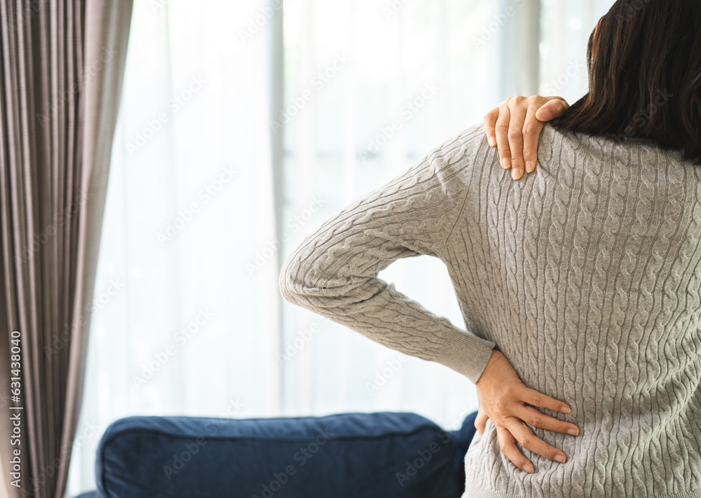 Young woman has problem with structural posture back neck and shoulder ...