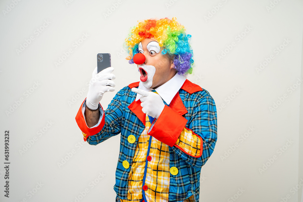 Mr Clown. Portrait of Funny face Clown man in colorful uniform standing ...
