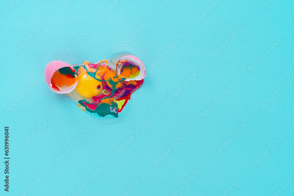 Broken bright pink eggshell with raw egg yolk and white painted in ...