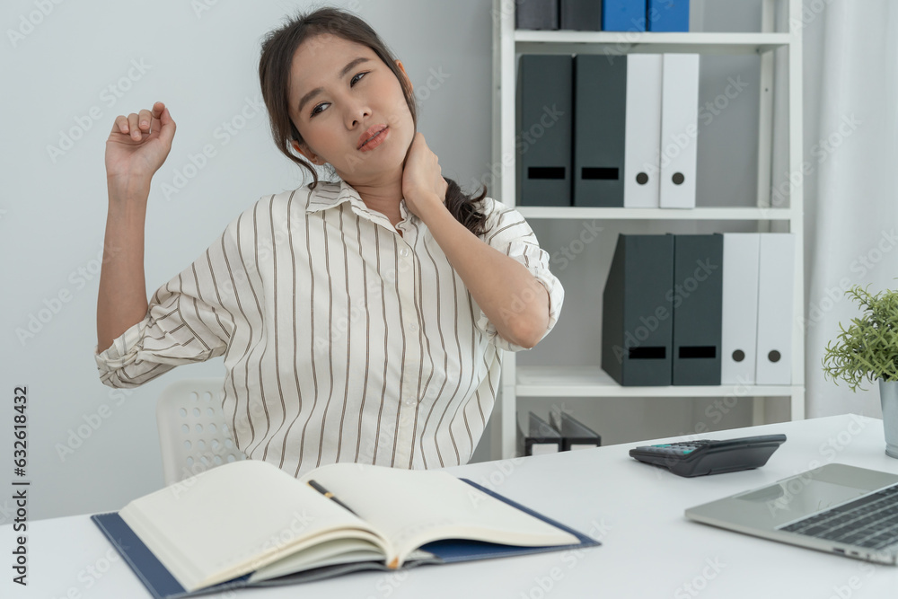 office syndromes, woman massaging neck pain due to work and using a ...