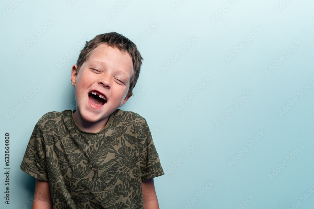The kid lost a tooth. Baby without a tooth. Portrait of a little boy no ...