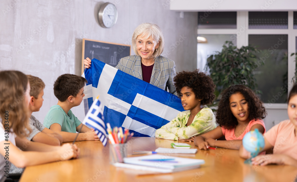 Qualified elementary school woman teacher working in a high school ...