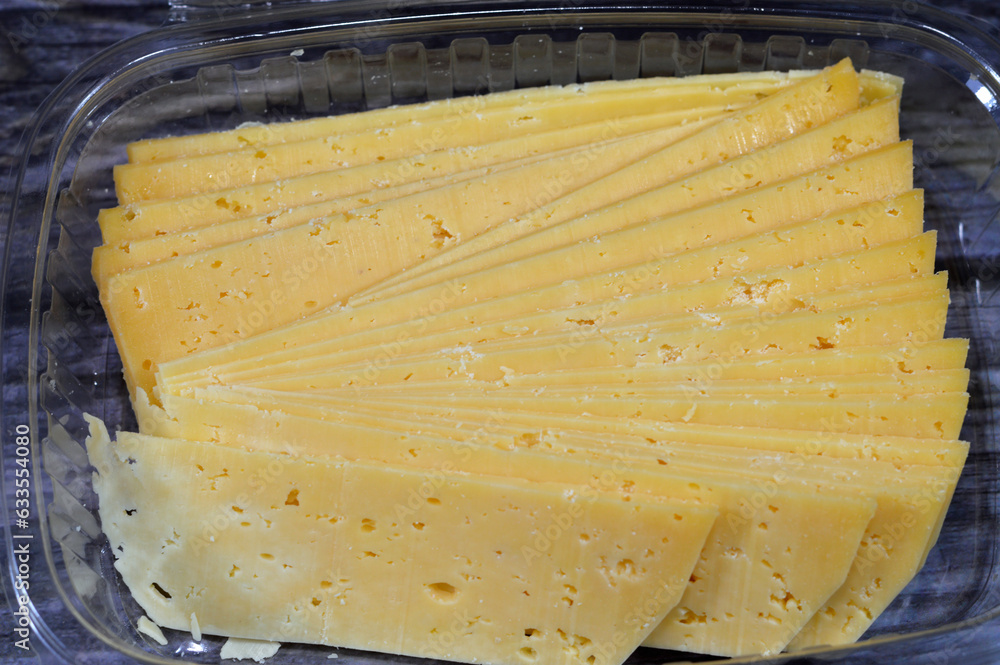 ภาพถ่าย Stock Slices of Egyptian Rumi cheese, also called gebna romiya ...