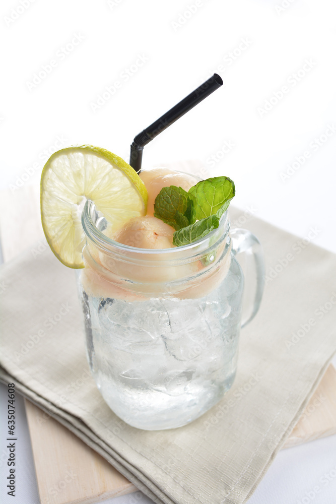 cold iced lychee fruit juice soda with lemon longan mint leaf in ...