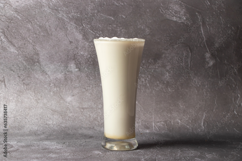 Vanilla Milkshake or lassi and milk served in glass isolated on ...