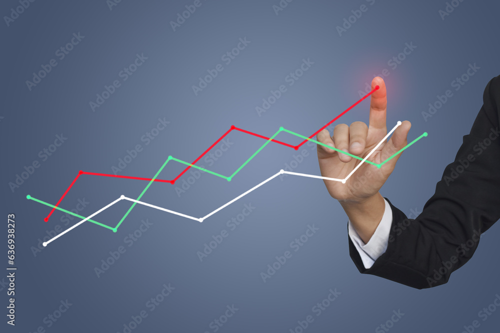 Hand touching graphs of financial indicator and accounting market ...