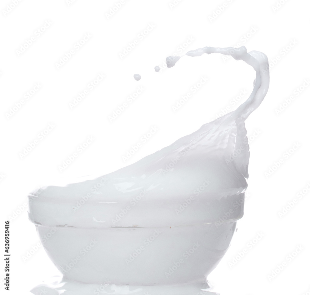 Milk yogurt white water spill splash from bowl up. Milk lotion pour ...