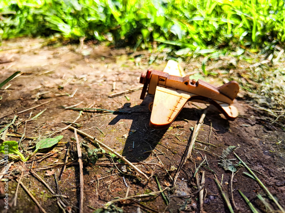 Vintage toy wooden airplane in nature. Private adventure traveling by ...