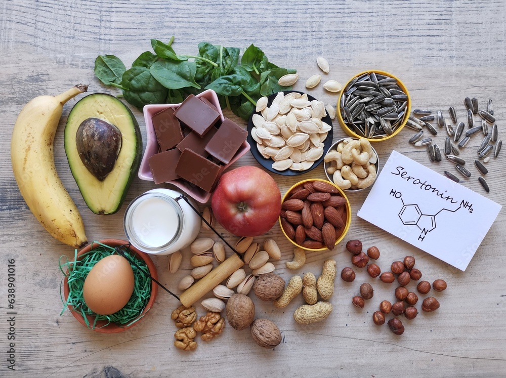 Serotonin-boosting foods. Assortment of food for good mood and ...