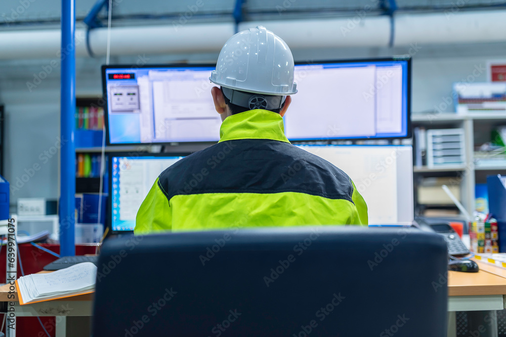 Inside the large Industry Factory Female Computer Engineer Works on ...