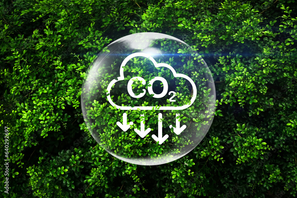 CO2 emission reduction sign and arrows down with earth globe on green ...