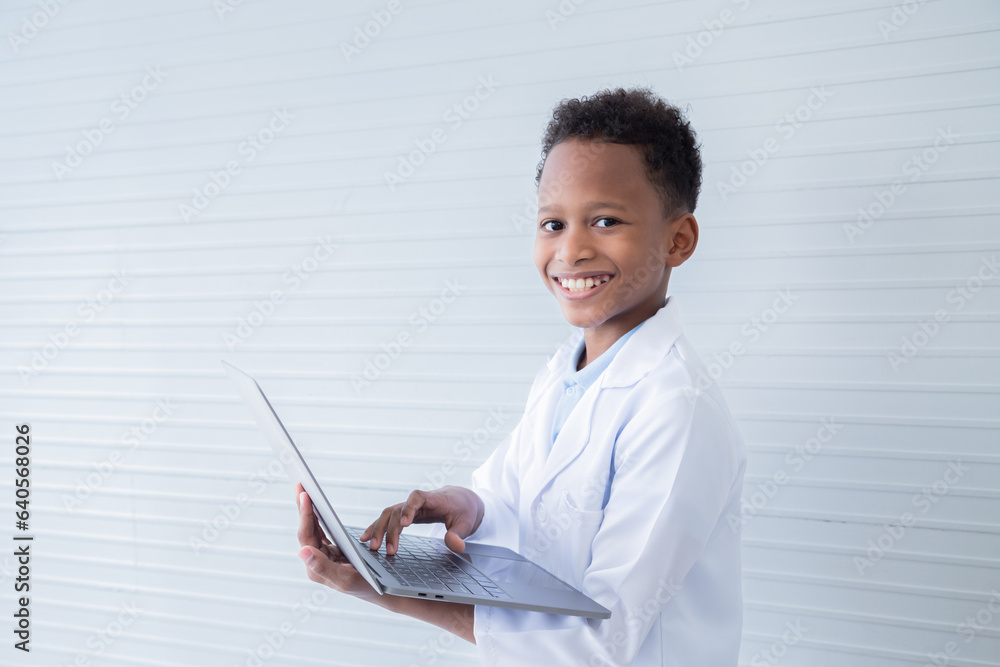 Cheerful African American boy student kid primary school hold modern ...