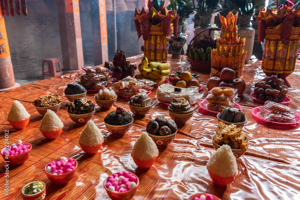 Ritual offerings to deity on a temple altar. Chinese sacrificial ...