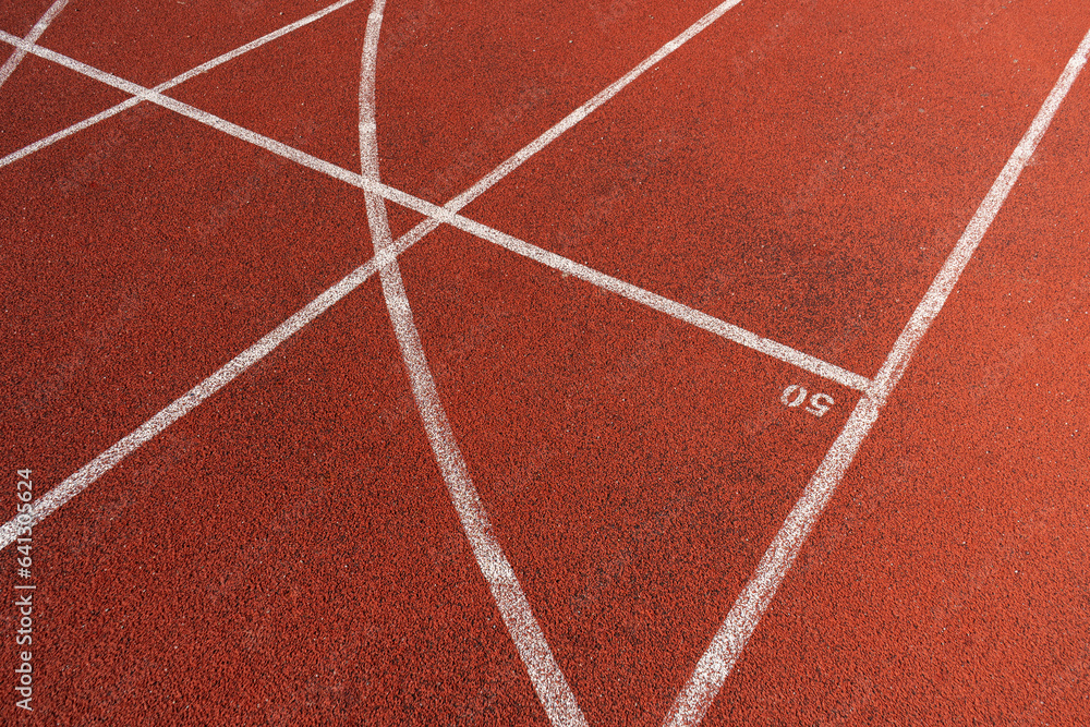 Running track surface with lanes and lines on a track and field ...