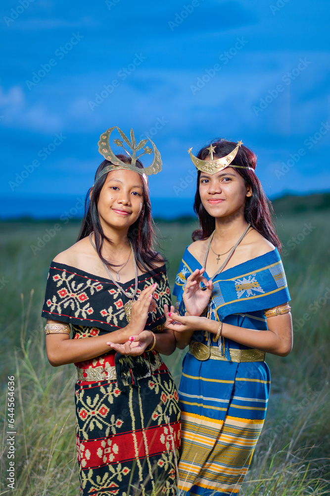 beautiful womens wearing local clothes from the Sumba and rote island ...