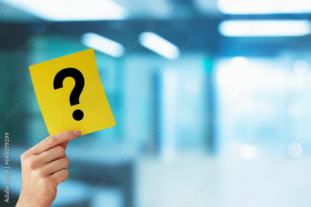 Question mark design. Hand holding note paper with question mark on ...