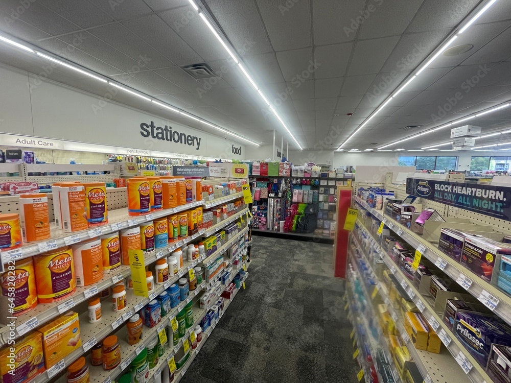 CVS Pharmacy and retail store interior looking down medicine aisle ...