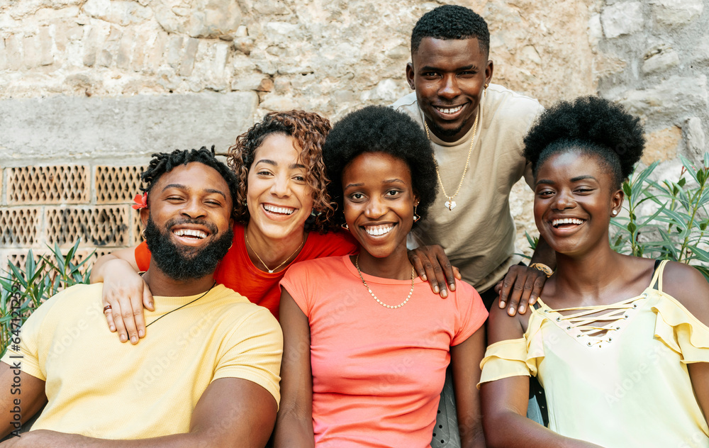 Young cheerful group of multiracial people sitting outdoors - Lifestyle ...