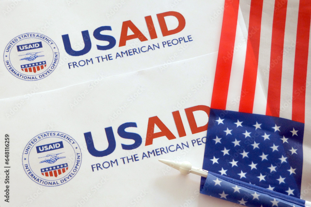 Kiev, Ukraine - 02 12 2023: USAid logo and US flag, USAid is USA agency ...