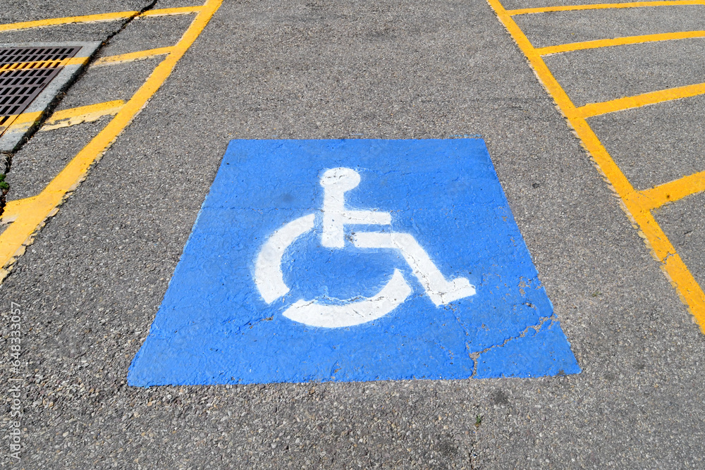 Photo Stock ADA parking symbol and yellow crosshatch. This allow ...