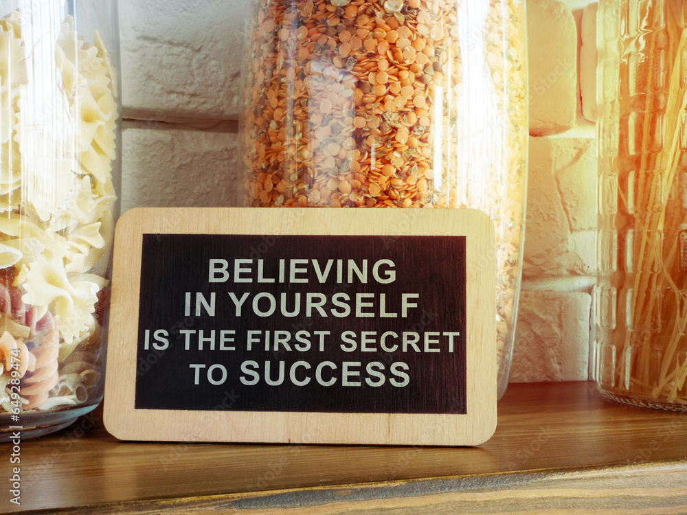 Sign with an inscription believing in yourself is the first secret to ...
