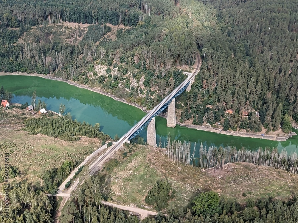 The Hracholusky dam with water power plant. The water reservoir on the river Mze. Source of ...