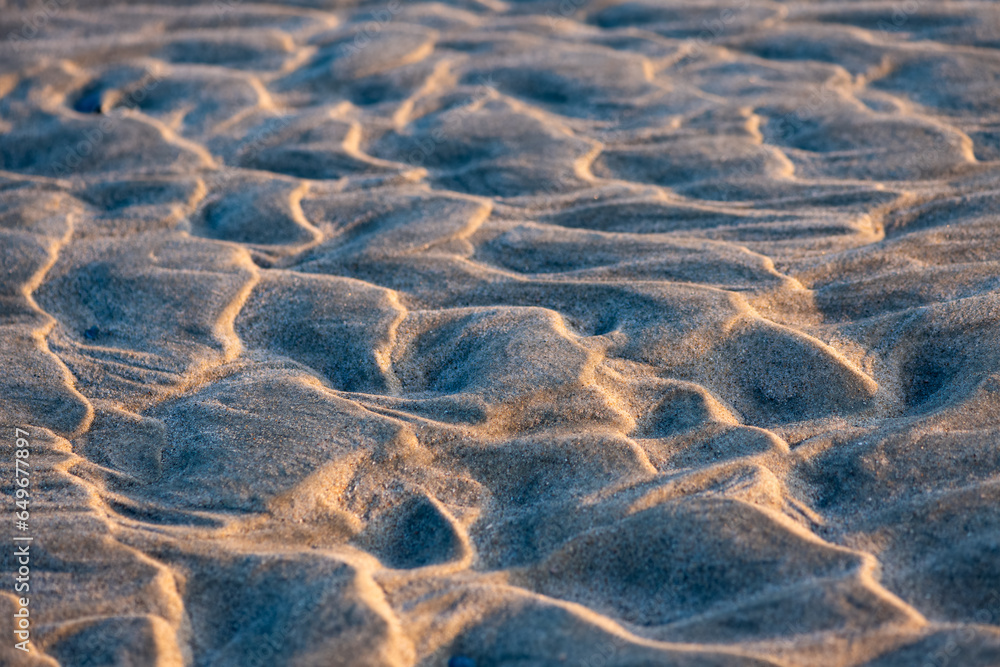 Sand structures with irregular ripples at low tide on the beach of ...