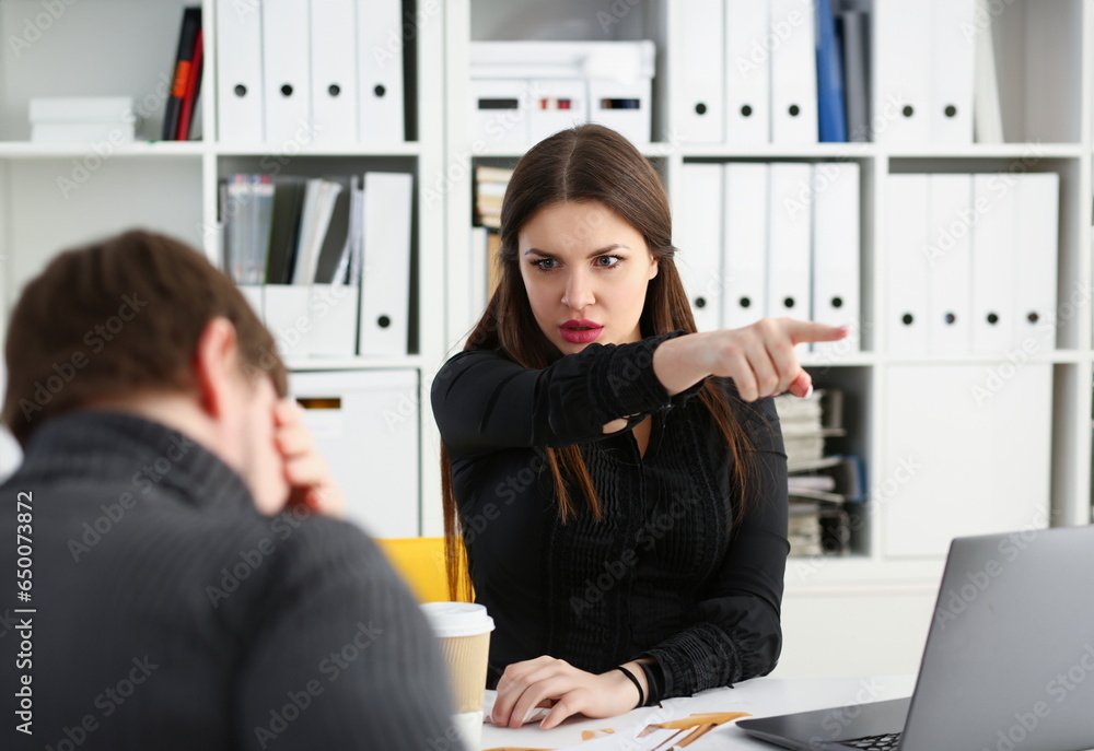 Angry yelling boss point arm to exit dismissing sad worker at office ...