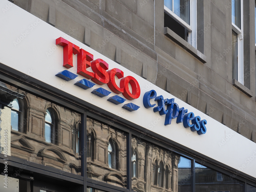 Tesco express shopfront sign in Dundee Stock Photo | Adobe Stock
