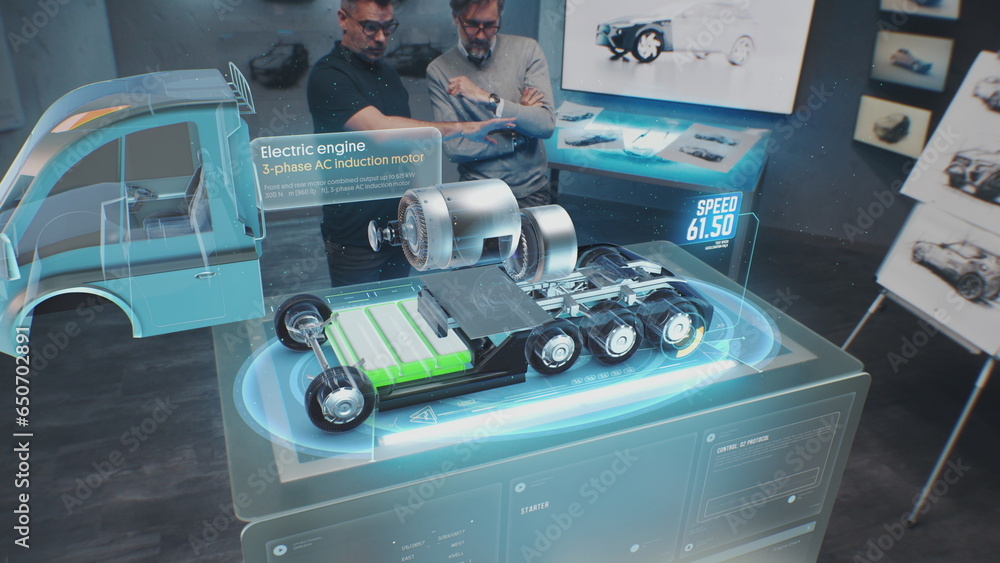 Two male automotive engineers create new eco-friendly truck with ...