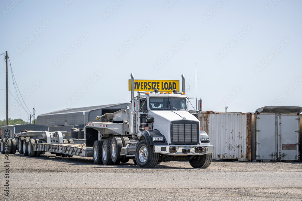 Oversize loader big rig powerful semi truck tractor with oversize load ...