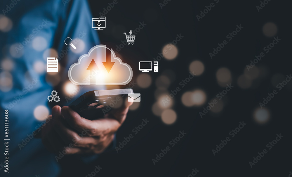 Business people hold smartphones with virtual glowing cloud computing ...