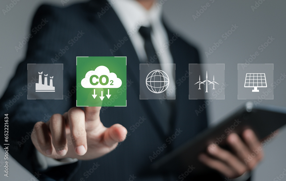 Reduce CO2 emissions concept, Businessman touch CO2 icon, reducing ...