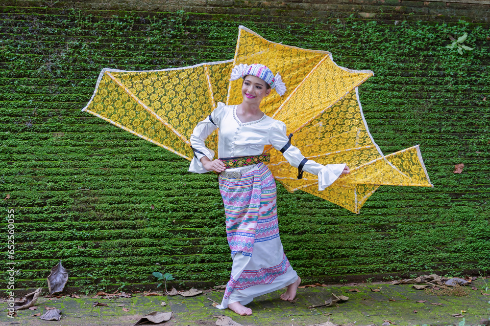 Beautiful Myanmar girl dancing performs imitating bird wings art shown ...